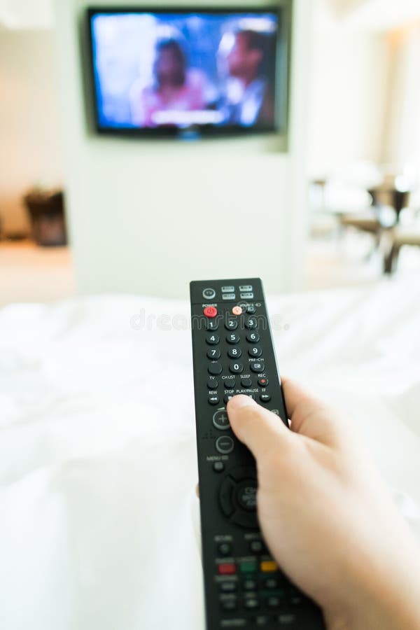 Hand Using Tv Remote Control Stock Image - Image of young ...
