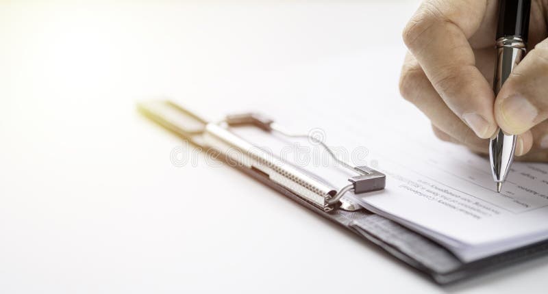Hand Using Writing Pen with Questionnaire or Paperwork Survey Question ...