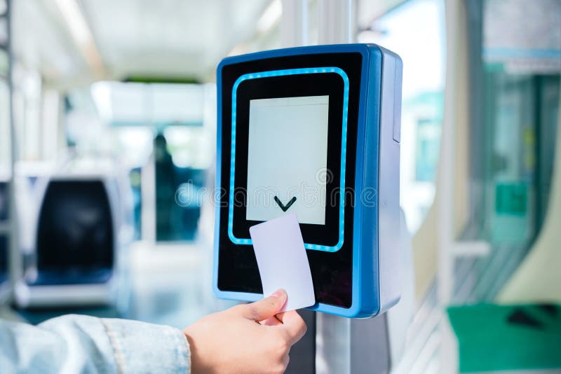 Hand Validating Ticket on Electronic Scanner Inside Public Transport ...