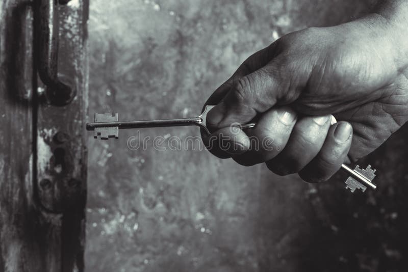 Hand with Vintage Key and Keyhole Close Up View Stock Image - Image of ...