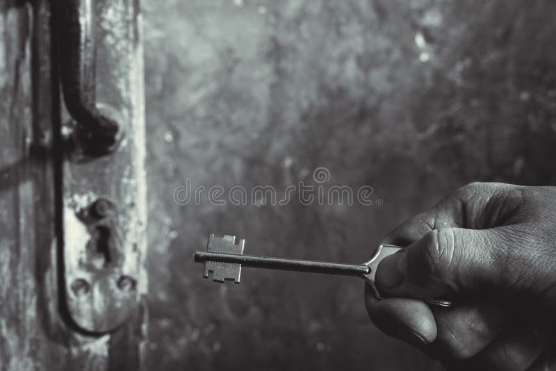 Hand with Vintage Key and Keyhole Close Up View Stock Image - Image of ...