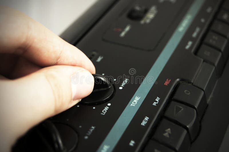 Fingers Adjusting a Volume Knob Stock Photo - Image of health, setting ...