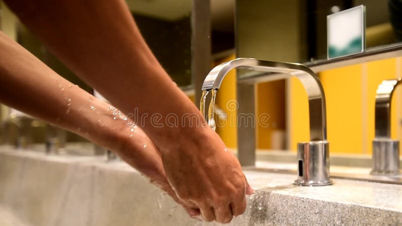 Hand wash in restroom stock footage. Video of hands - 145374472