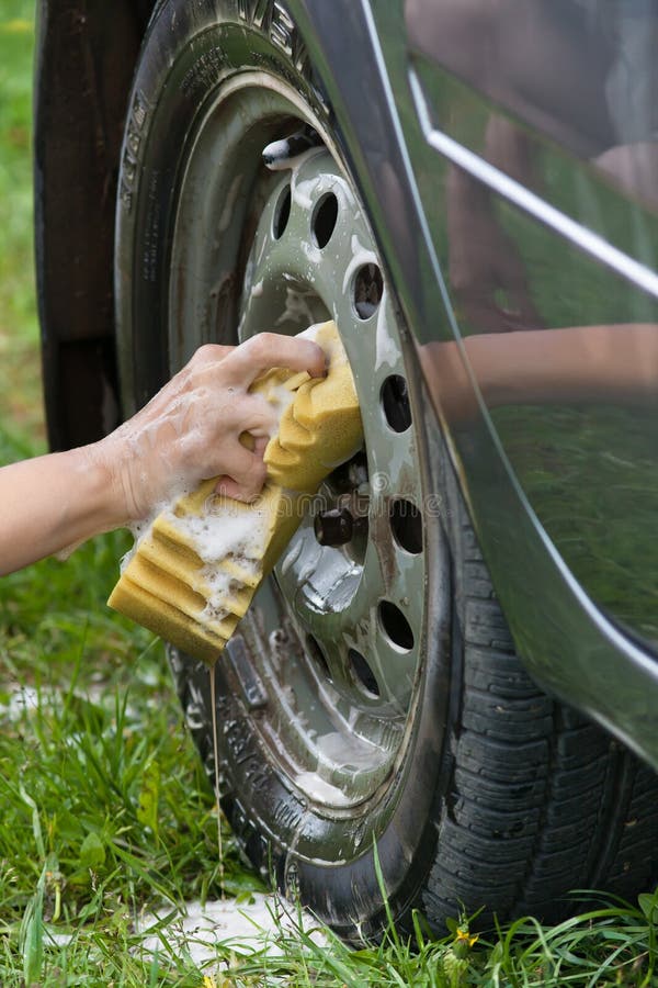 Hand Washing Car Wheel with Sponge Stock Photo - Image of wheel, wash ...