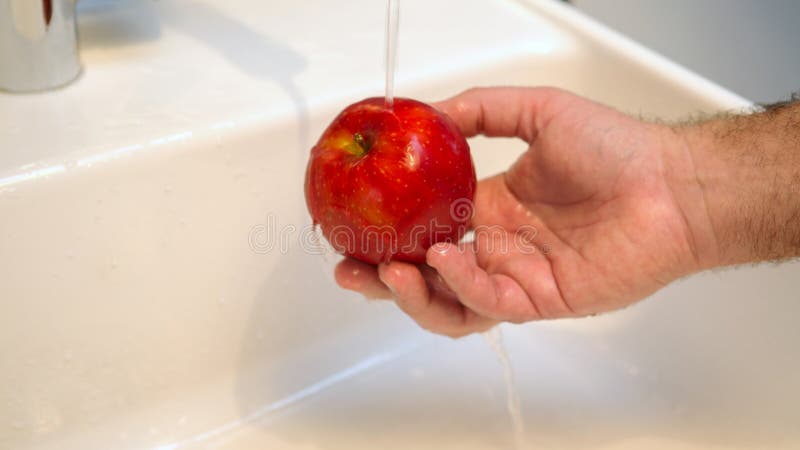Hand Washing a Red Apple in Sink Stock Photo - Image of diet, produce ...