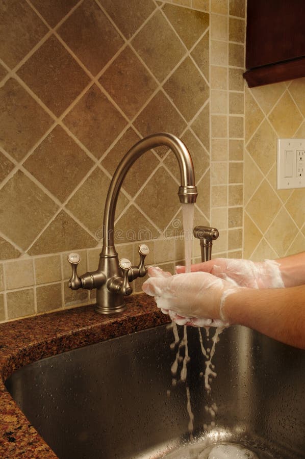 Hand Washing and Rinsing Soapy Water at a Sink Stock Image - Image of ...