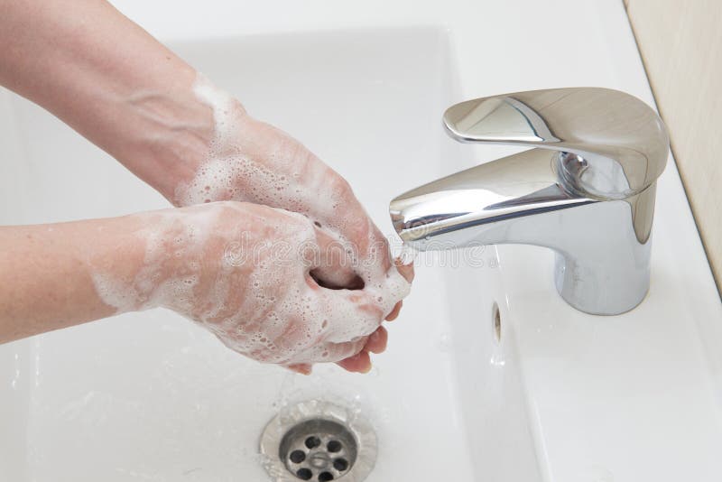 Hand washing with soap stock photo. Image of faucet - 180812962