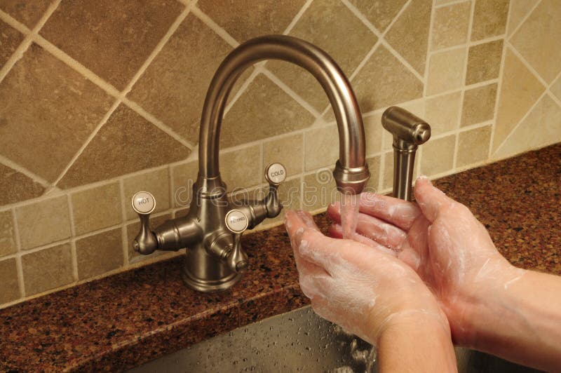 Hand Washing Under Water Flowing Out a Faucet Stock Photo - Image of ...