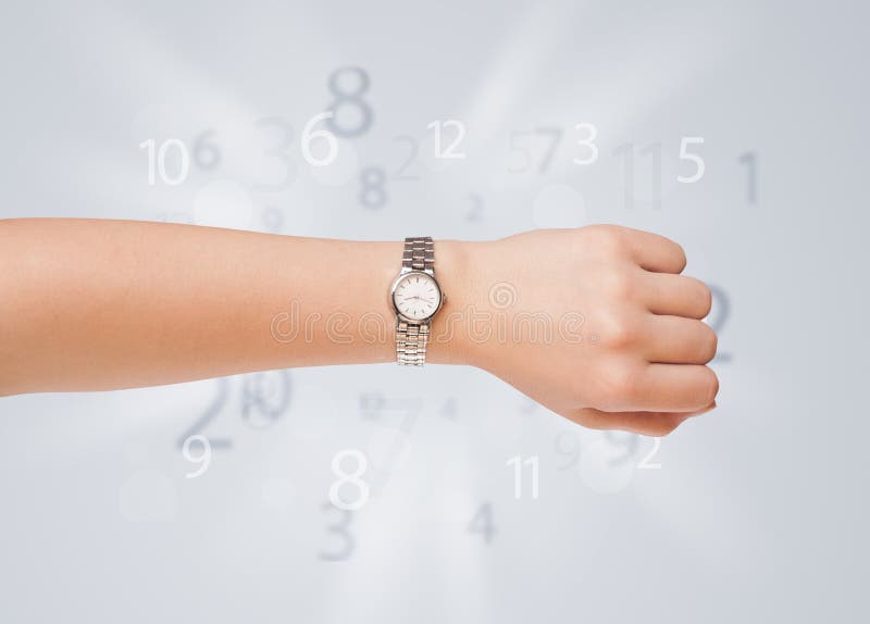 Hand with Watch and Numbers on the Side Comming Out Stock Image - Image ...