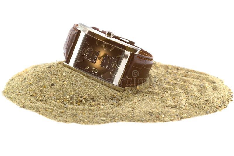 A hand watch on the sand stock photo. Image of sand, watch - 25659814