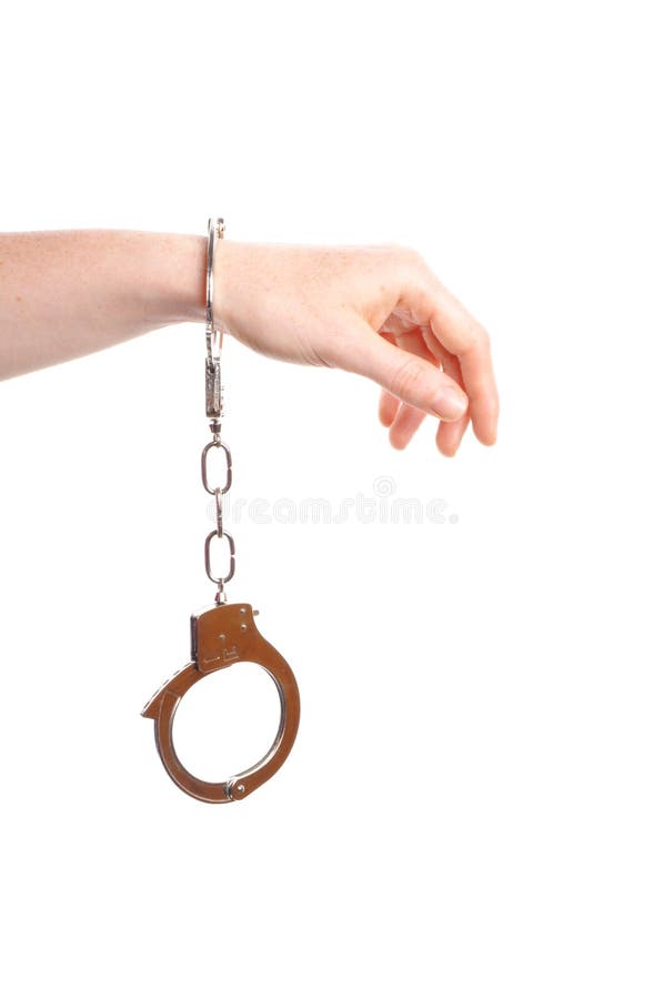Hand wearing handcuffs stock photo. Image of chains, criminally - 24150382