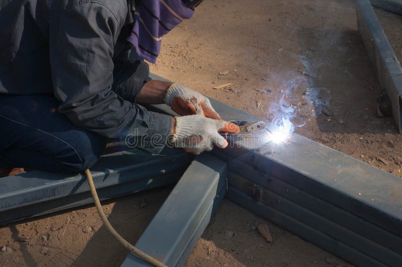 Hand welding electrod stock photo. Image of iron, glove - 64982590