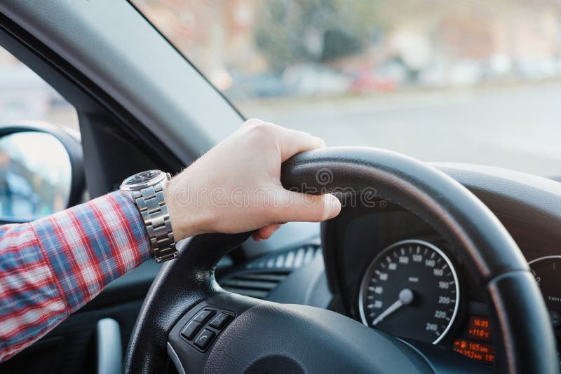 Hand on the Wheel of One Man Driving His Car Stock Image - Image of ...