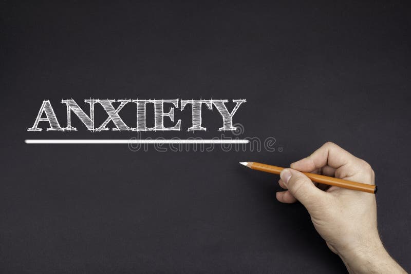 Hand with a White Pencil Writing: ANXIETY Stock Image - Image of ...