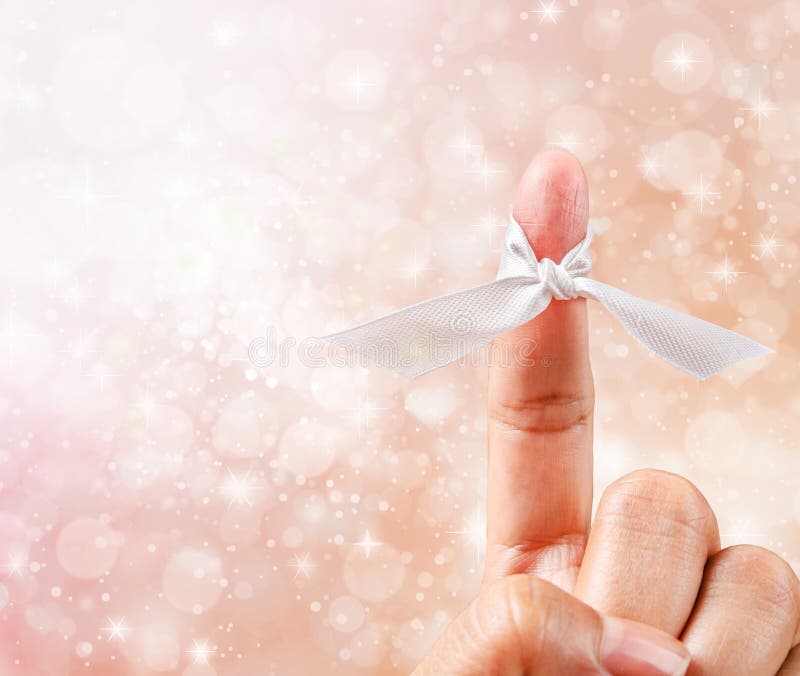 Hand with white ribbon. stock photo. Image of light, bokeh - 92214678