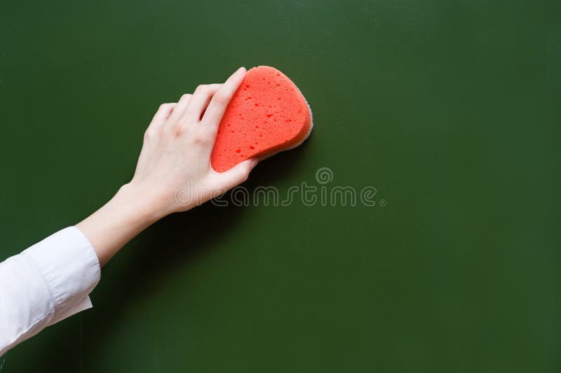 Hand Wipes the Chalkboard, with a Sponge Stock Image - Image of copy ...
