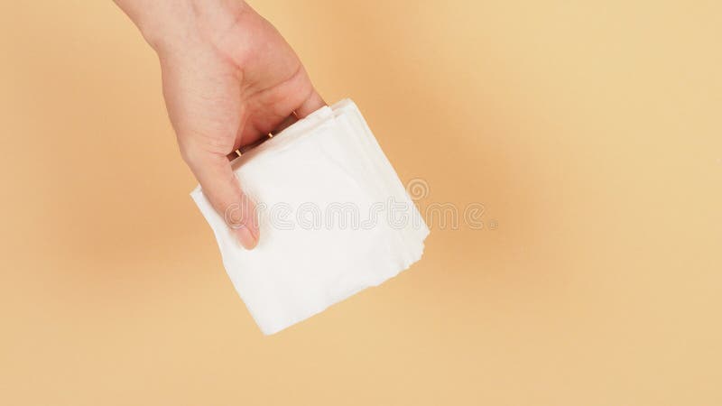 Hand is Wiping and Hold White Paper Tissue on Ivory Background Stock ...