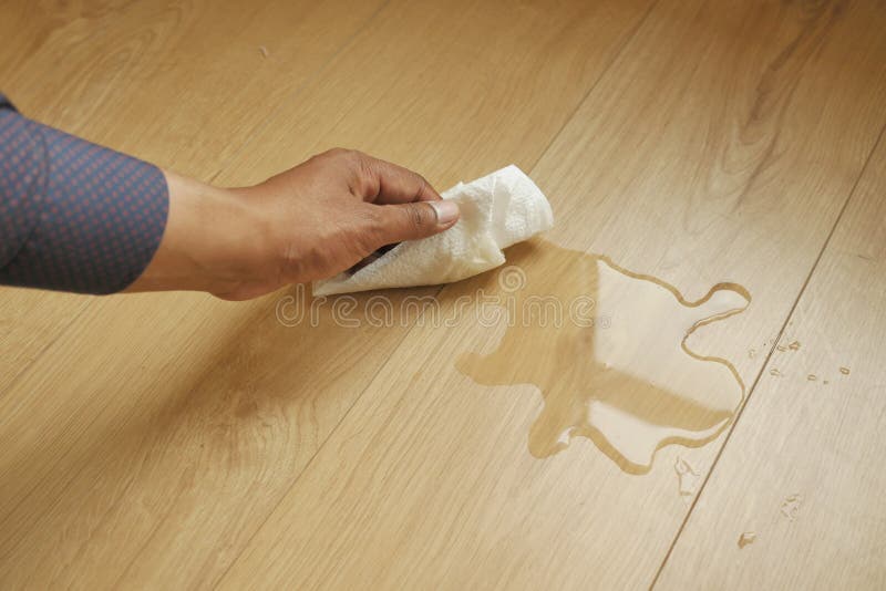 Hand Wiping Spilled Tea with Paper Napkin on Floor , Stock Photo ...