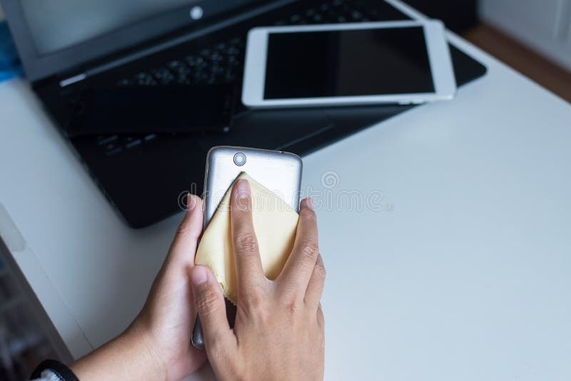 Hand Woman Cleaning Smart Phone on Screen with Microfiber Cloth Stock ...
