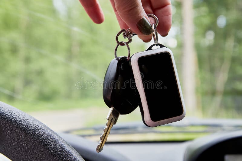 Hand of Woman Holding Car Key in a Car Stock Image - Image of finger ...
