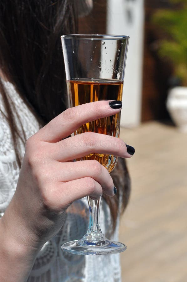 Hand of a Woman Holding a Glass Stock Image - Image of holding, hand ...
