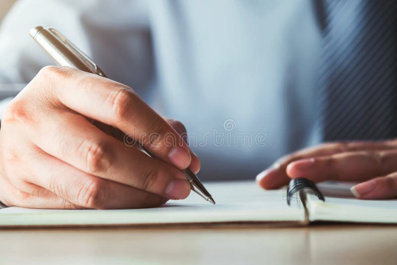 Hand of Woman Holding Pen with Writing on Paper Stock Image - Image of ...