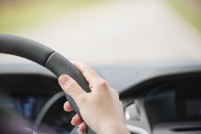 Hand of Woman on Steering Wheel Inside Car Stock Image - Image of ...