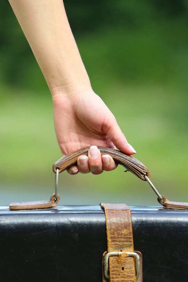Hand of a Woman with a Suitcase Stock Image - Image of smiling, dress ...