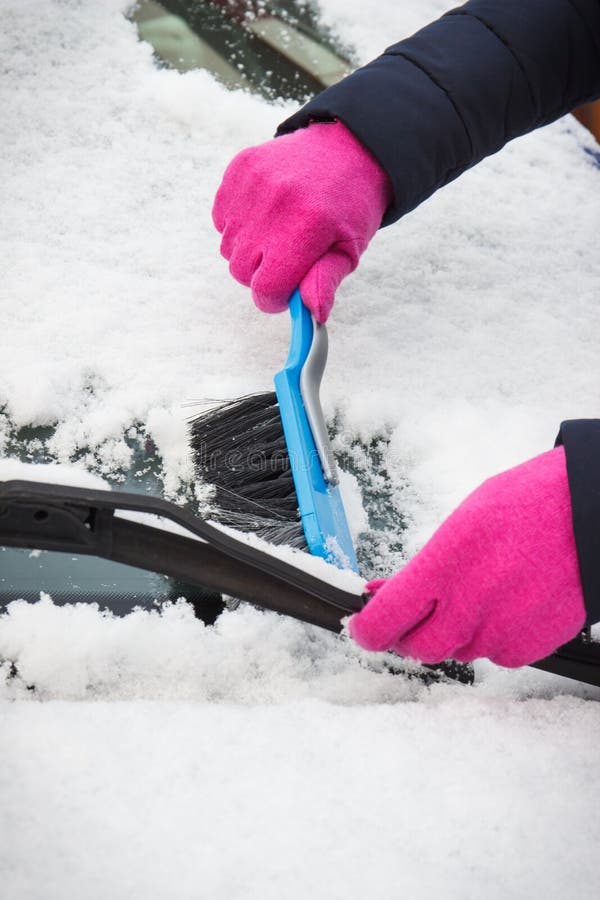 Hand of Woman Using Brush and Remove Snow from Car and Windscreen Stock ...