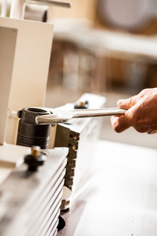 Hand of a Woodworker Setting Up a Milling Cutter Stock Image - Image of ...