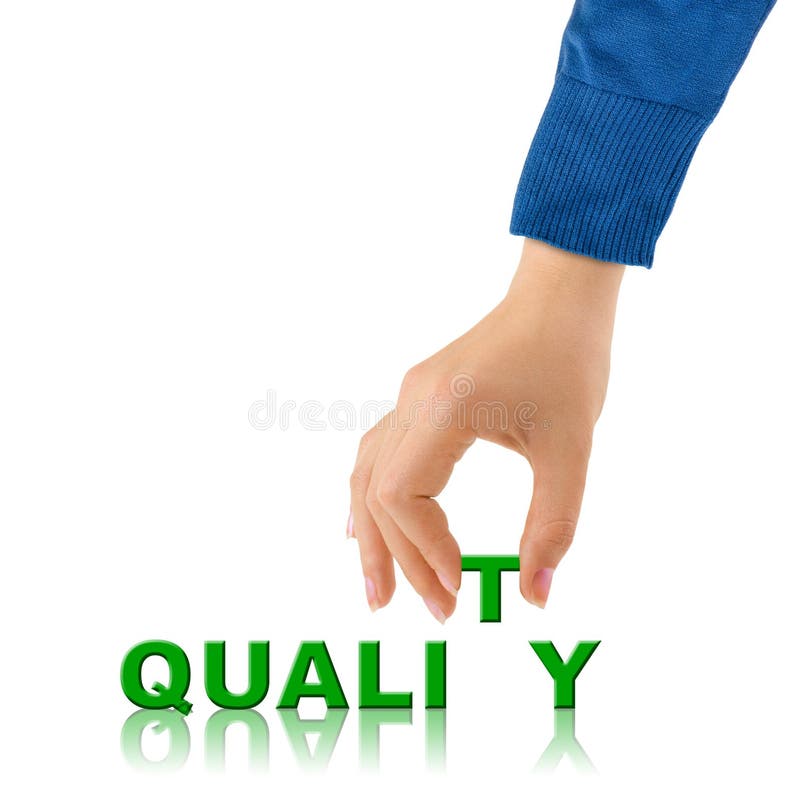 The Word QUALITY on Small Wooden Blocks at the Desk. Top View Stock ...