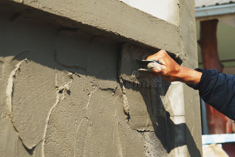 Hand of Worker Plastering Cement on Wall Stock Photo - Image of hand ...