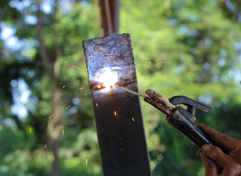 Hand of Worker Welding Metal Stock Photo - Image of factory, spark ...