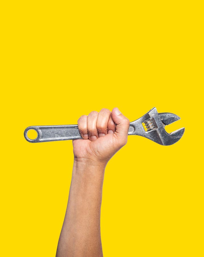 Hand of a Worker with a Wrench, Symbol of Labor Day Stock Photo - Image ...