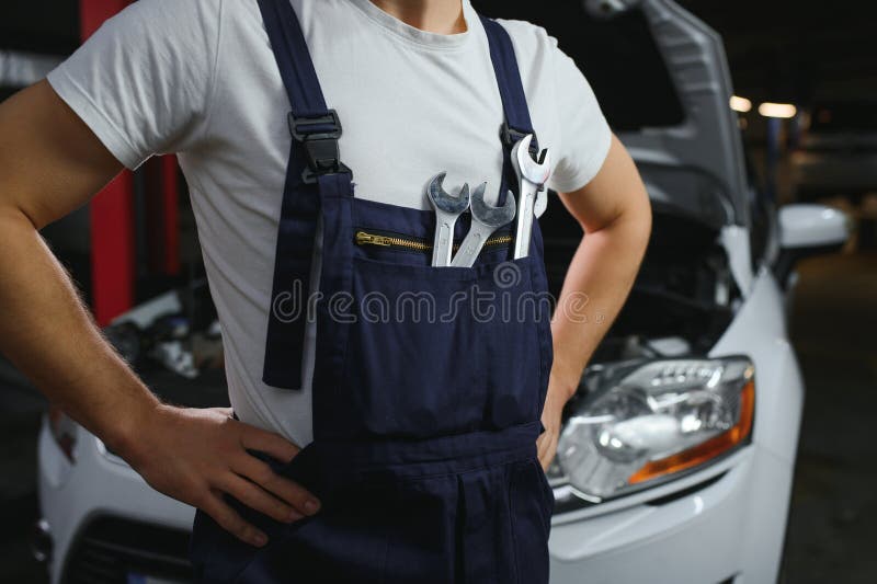 Hand with Wrench. Auto Mechanic in Car Repair . Stock Photo - Image of ...