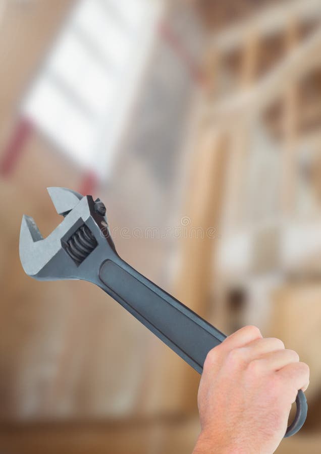 Hand with Wrench on Building Site Stock Photo - Image of isolated ...
