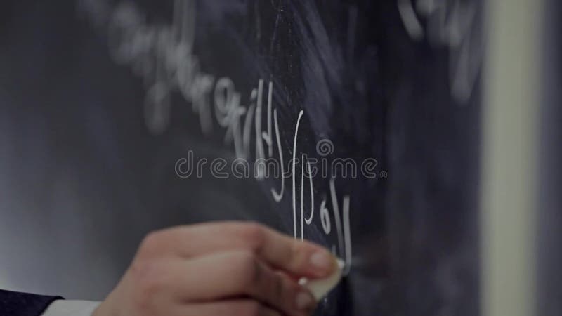 Men Writes on the Blackboard a Formula Stock Video - Video of ...