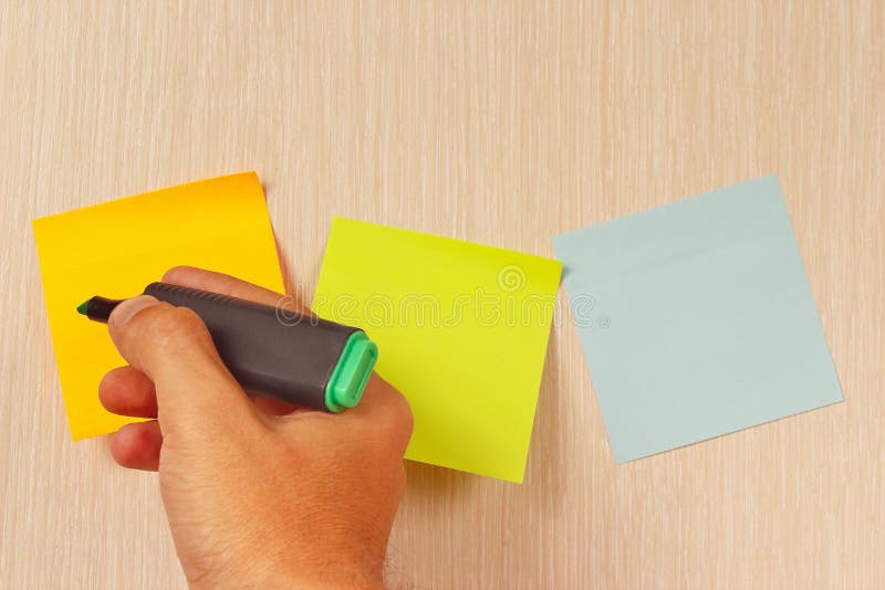 Hand Writes a Green Marker on the Sticker on Wooden Message Board Stock ...