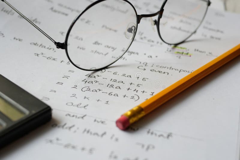 Hand Writing Algebra Equations on a Paper Stock Photo - Image of ...