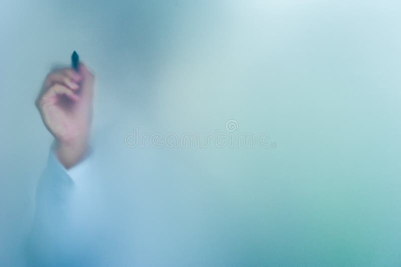 Hand Writing on Blurred Glass Wall, Abstract Background Stock Photo ...