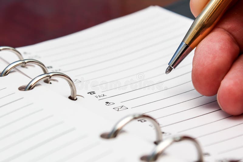 Hand writing a contact stock image. Image of education - 55089681
