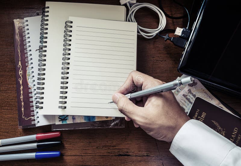 Hand Writing Holding Pen Notebook, on Messy Working Table, Vintage Tone ...