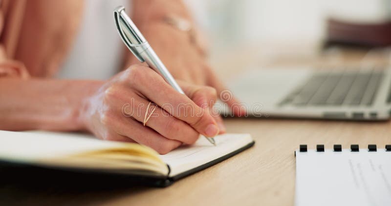 Hand, Writing and Notebook with a Business Woman Doing Research while ...