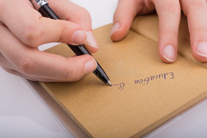 Hand writing on a notebook stock image. Image of notepad - 144737175