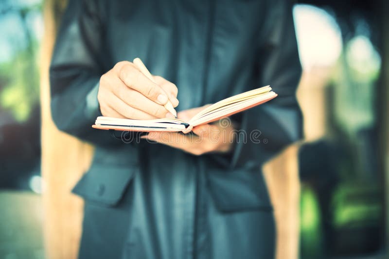 Hand Writing in Notebook Front Stock Photo - Image of hands, blank ...