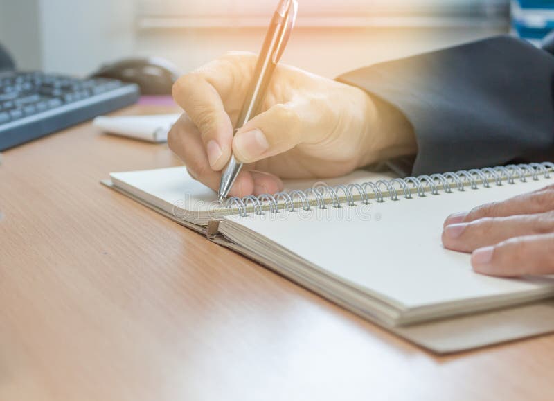 Hand writing notebook stock image. Image of hand, white - 100720355