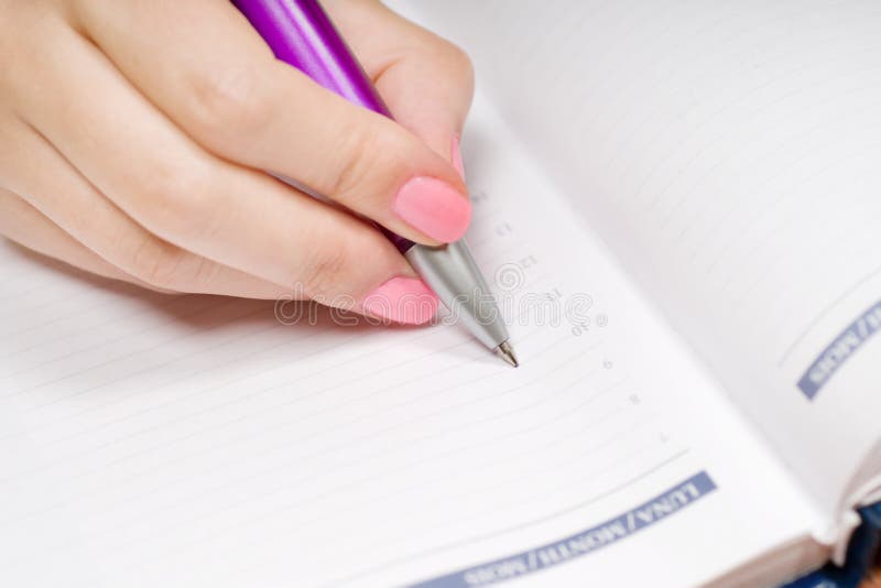 Hand Writing in a Notebook with Luxurious Pen Stock Image - Image of ...