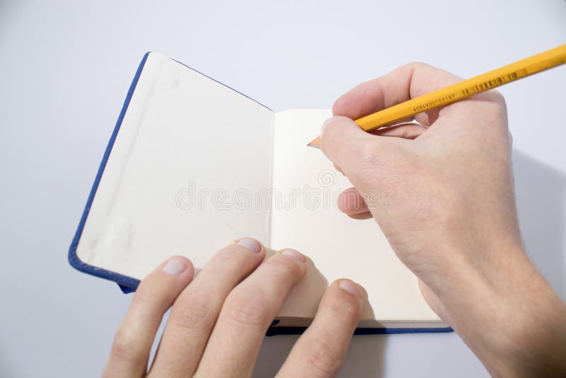 Hand is Writing on a Notebook with a Pencil Stock Photo - Image of ...