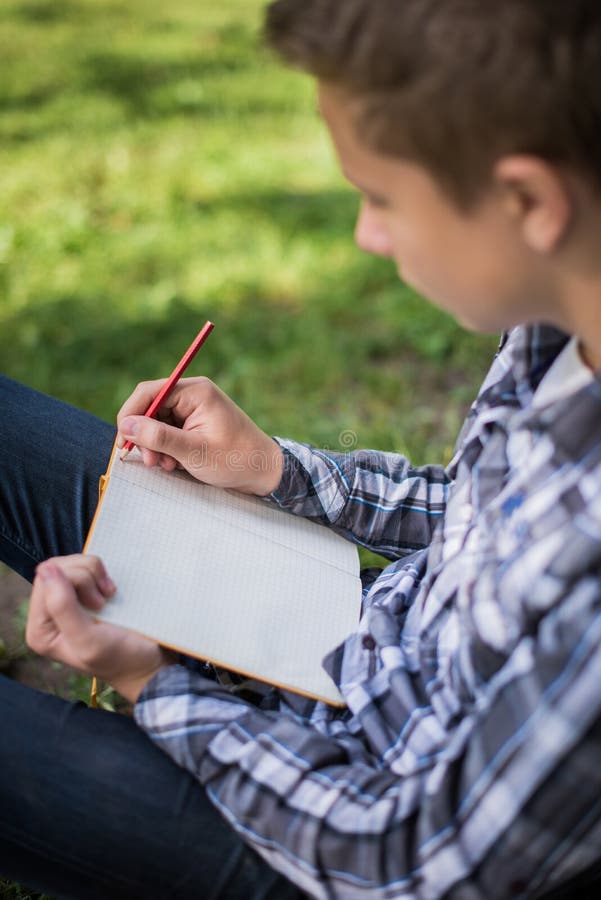 Hand writing in notebook. stock photo. Image of dreaming - 76461328