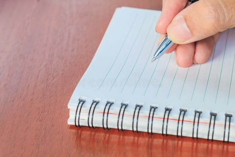 Hand Writing Notes Book on Wood Table, Selective Focus. Stock Image ...